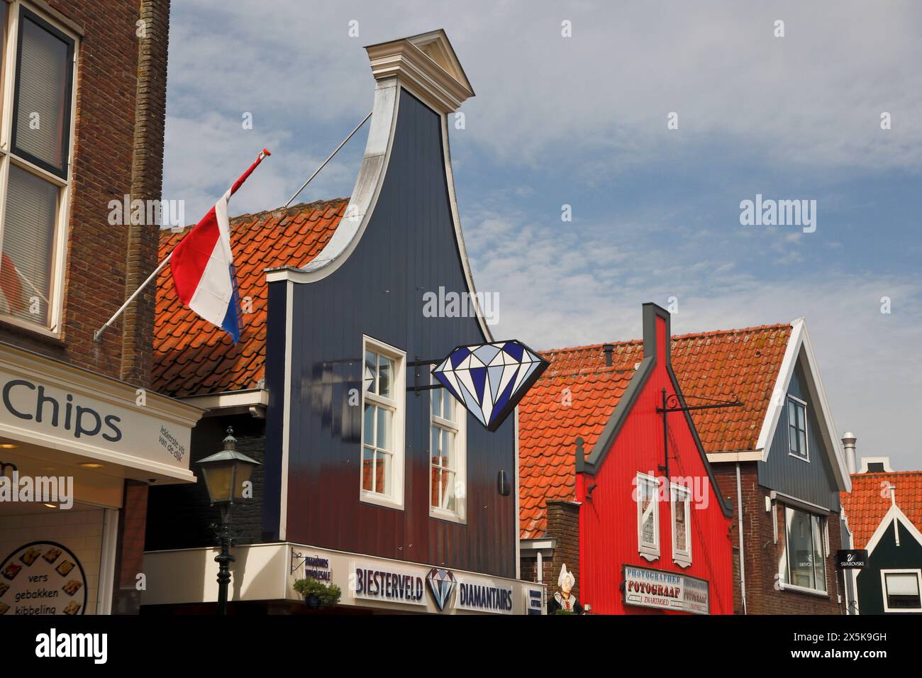 Holland, Netherlands, Volendam. Traditional buildings at the fishing ...