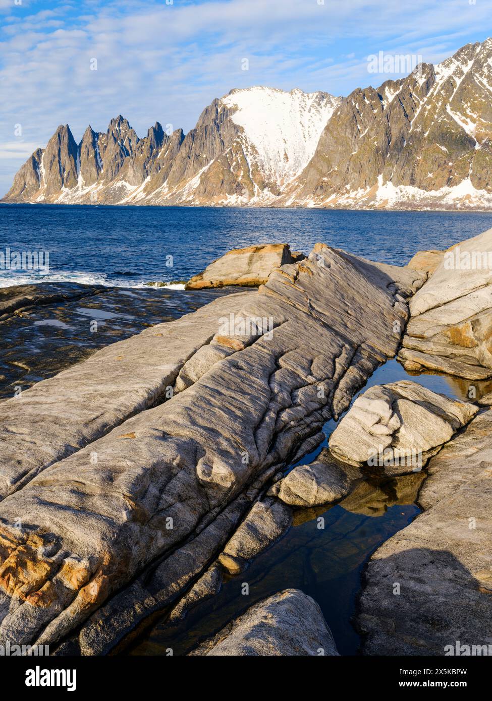 Coastal landscape at Tungeneset and the peaks Okshornan (Devils Teeth ...