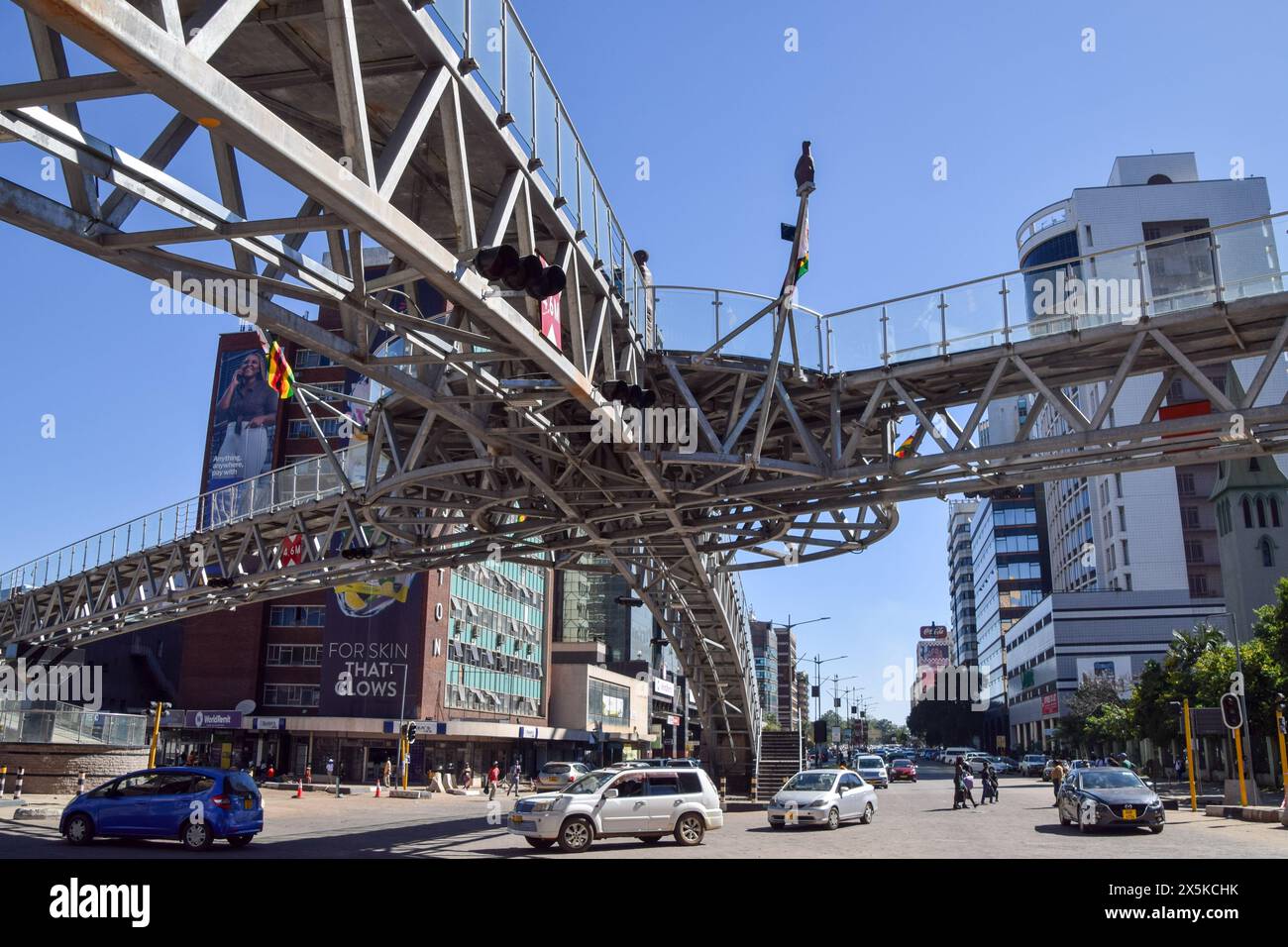 Harare, Zimbabwe, 21st April 2024: Pedestrian bridge with the statue of ...