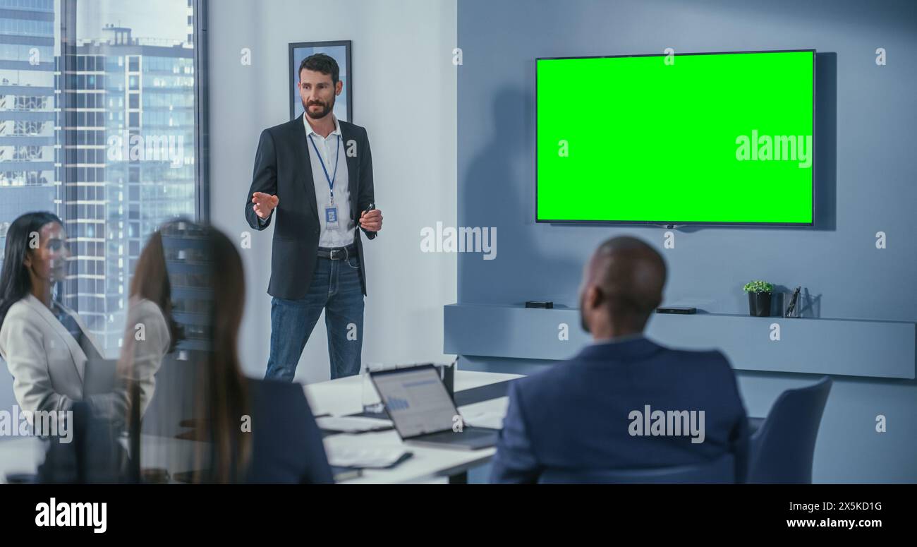 Office Conference Room Meeting Presentation: Handsome Businessman Talks ...