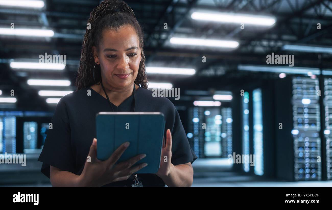 Server Farm Cloud. Computing Specialist Facility with Multiethnic Female System Administrator ...