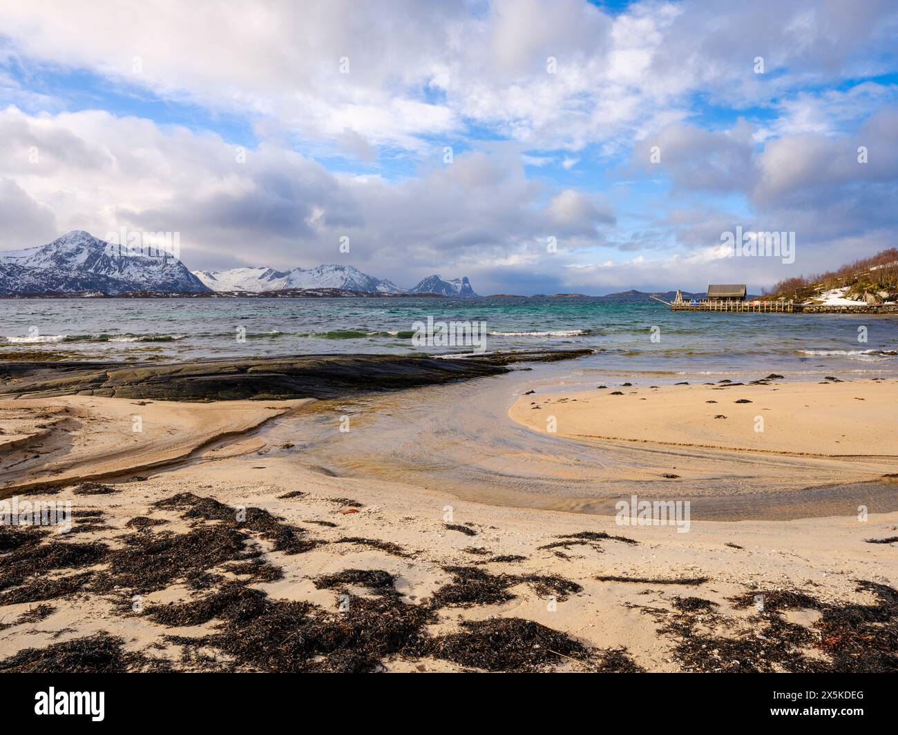 Beach of Bergsfjorden near Skaland. The Senja island during winter in ...
