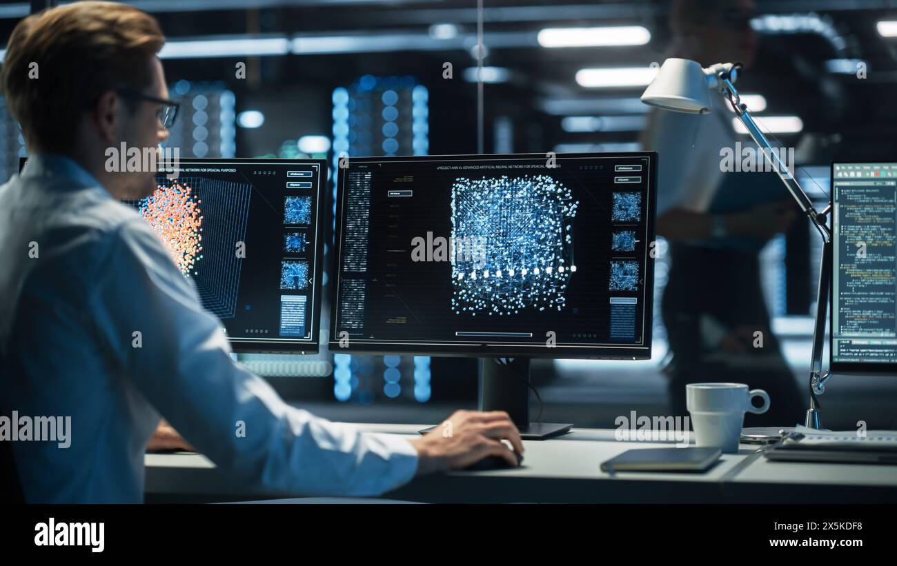 Operator Sitting and Monitoring Various Activities Showing on Multiple ...