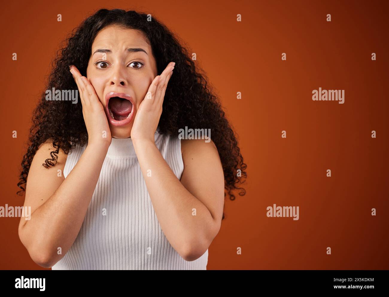 Woman, portrait and shocked in studio for sad news, announcement and ...