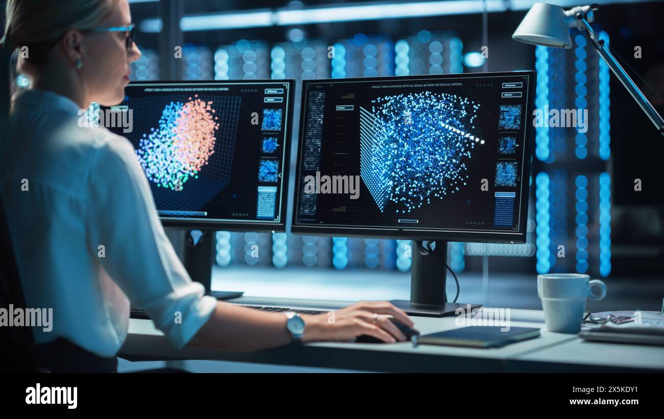 Female Technical Operator Works at Her Workstation with Multiple Displays Showing Neural Network ...