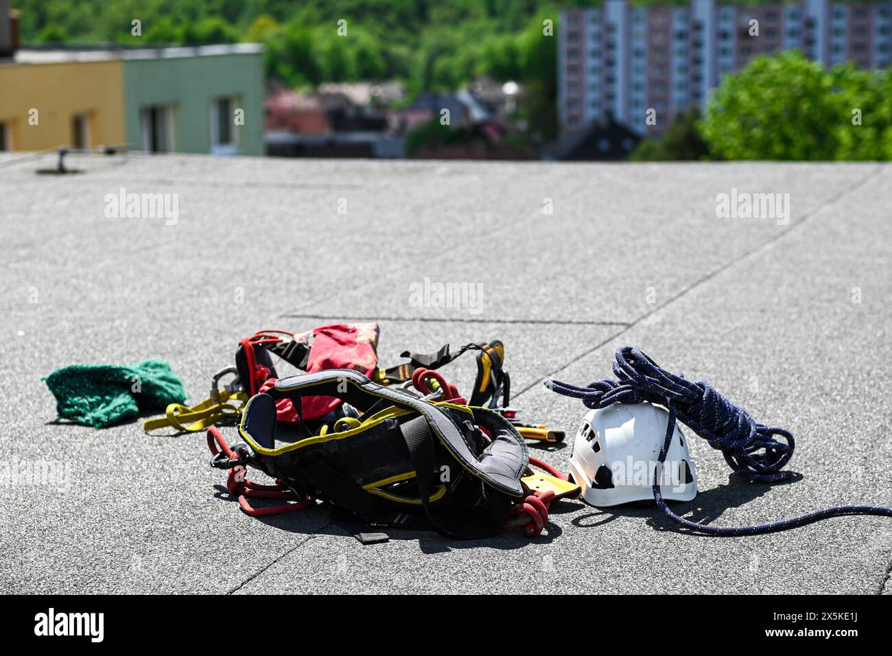 climbing equipment on the roof of an 8-story apartment building ...