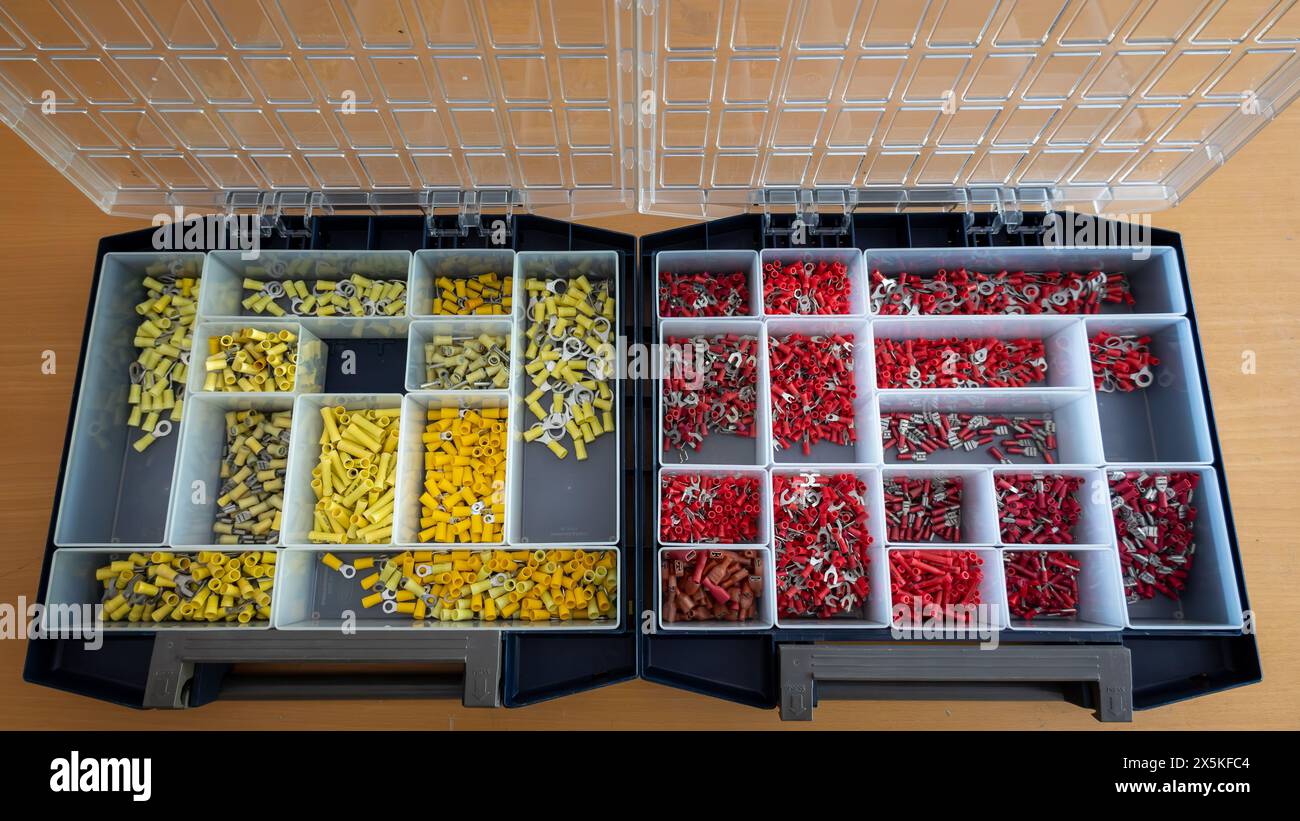 Boxes full of cable connectors and cable lugs in different colors and different sizes, suitable ...
