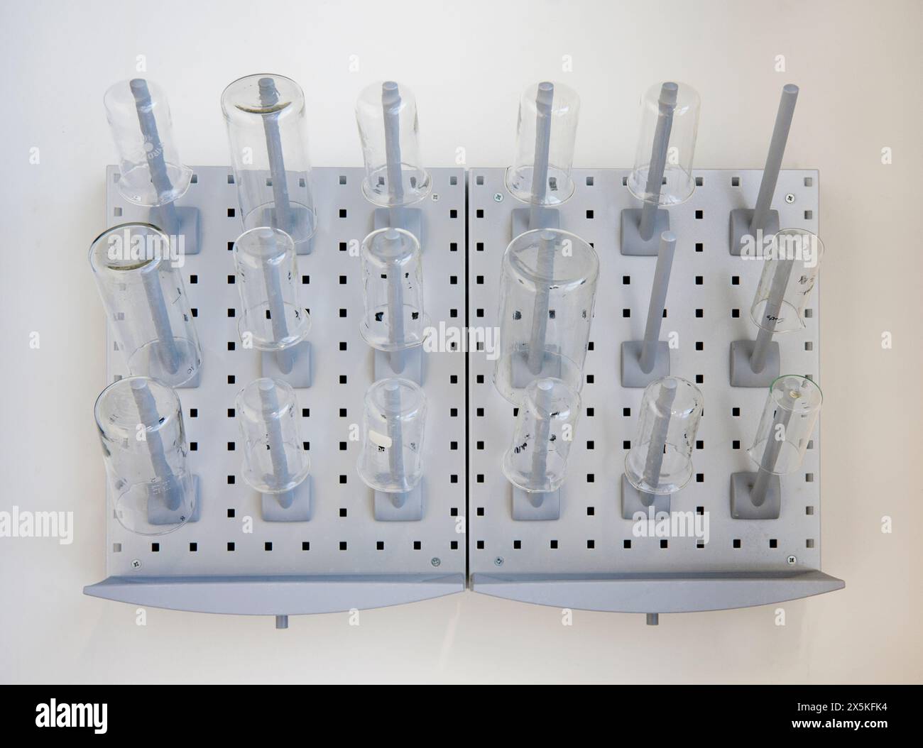 A wall rack of jars and flasks in the Chemistry laboratory at a ...