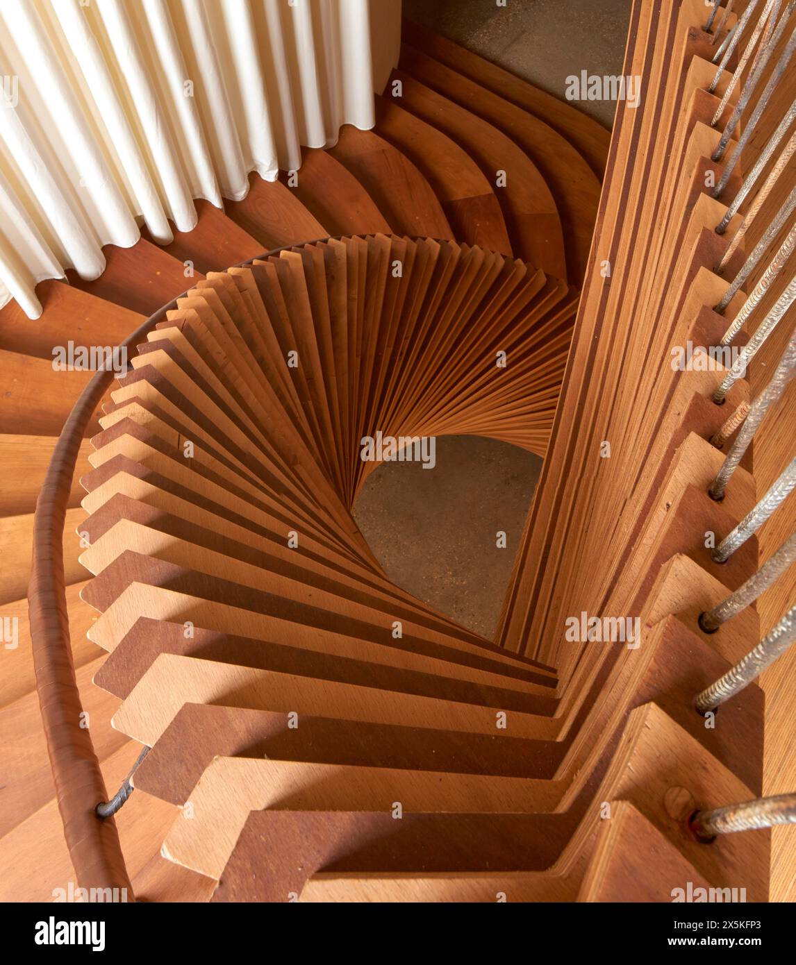 Detail of sculptural curvaceous timber staircase. ACME Offices, London ...