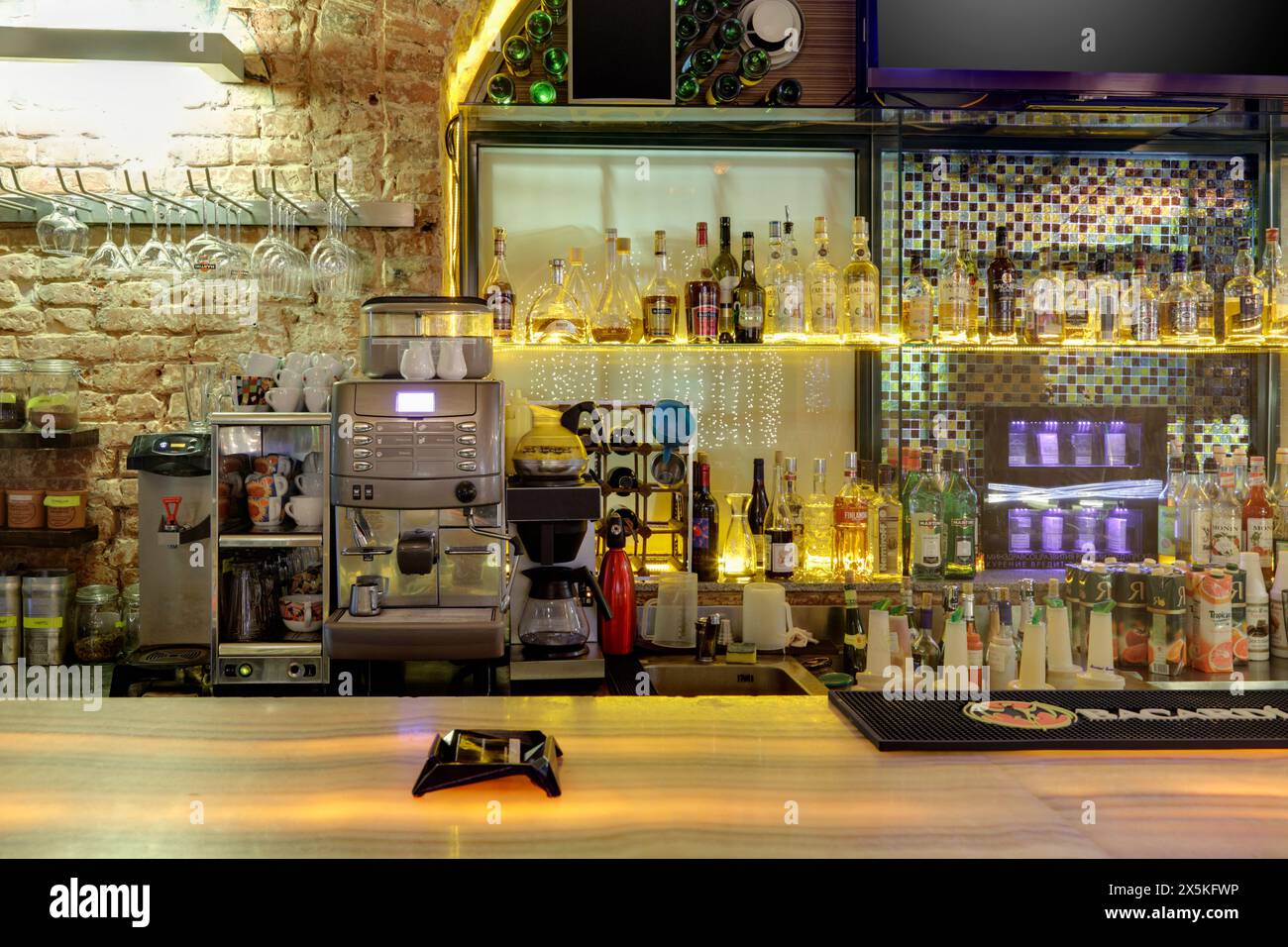 Drinks,coffee machine and cigarettes in bar Stock Photo - Alamy