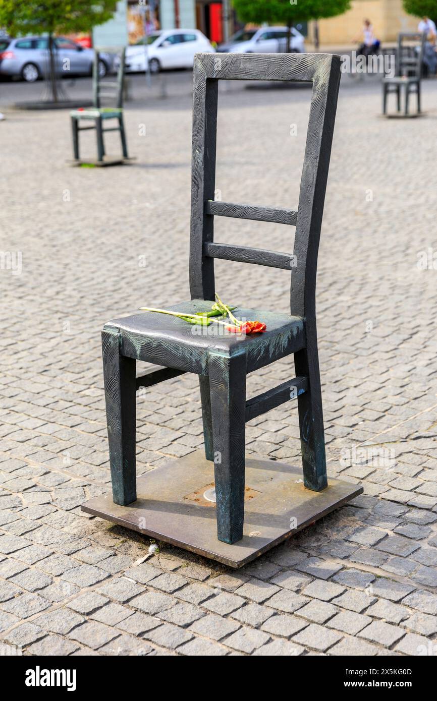 Poland, Krakow, Kazimierz District. Empty chair, part of memorial in ...