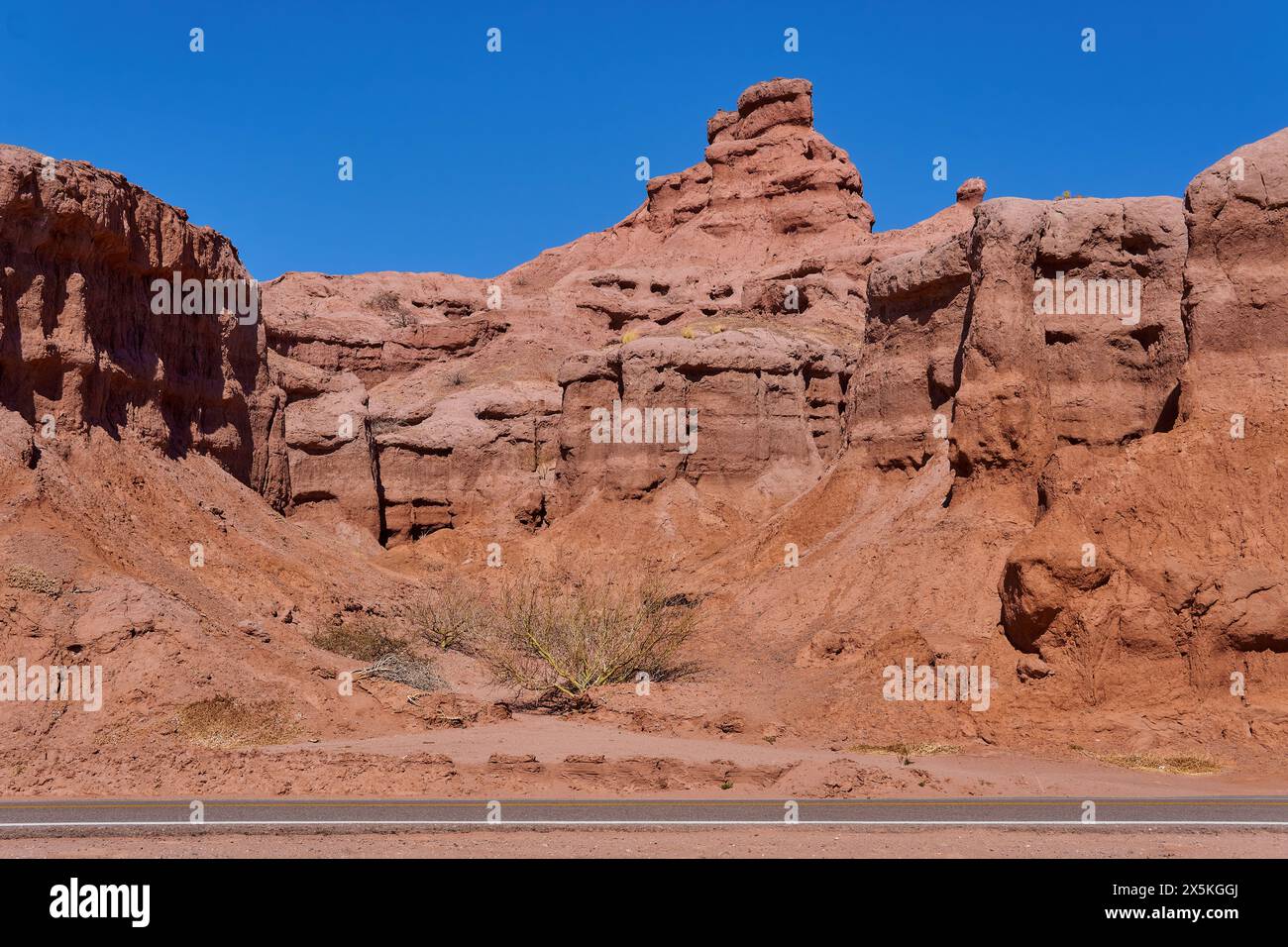 orange rocky mountain landscape in Cafayate, Salta, Argentina with blue ...
