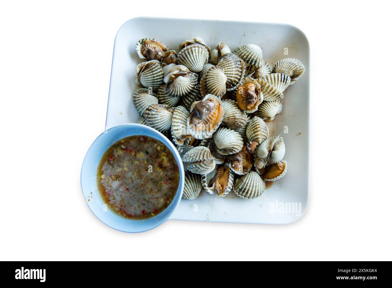 Die cut of Steamed cockle ( Boiled cockles ) with spicy seafood sauce ...