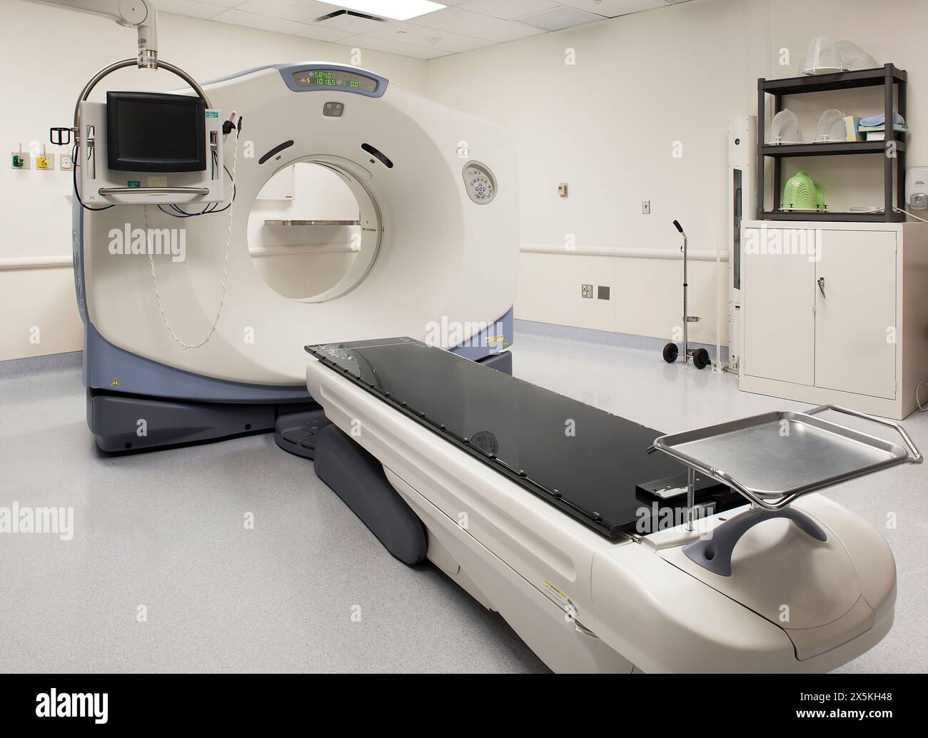 A large MRI magnetic resonance imaging scanner,with a patient bed Stock ...
