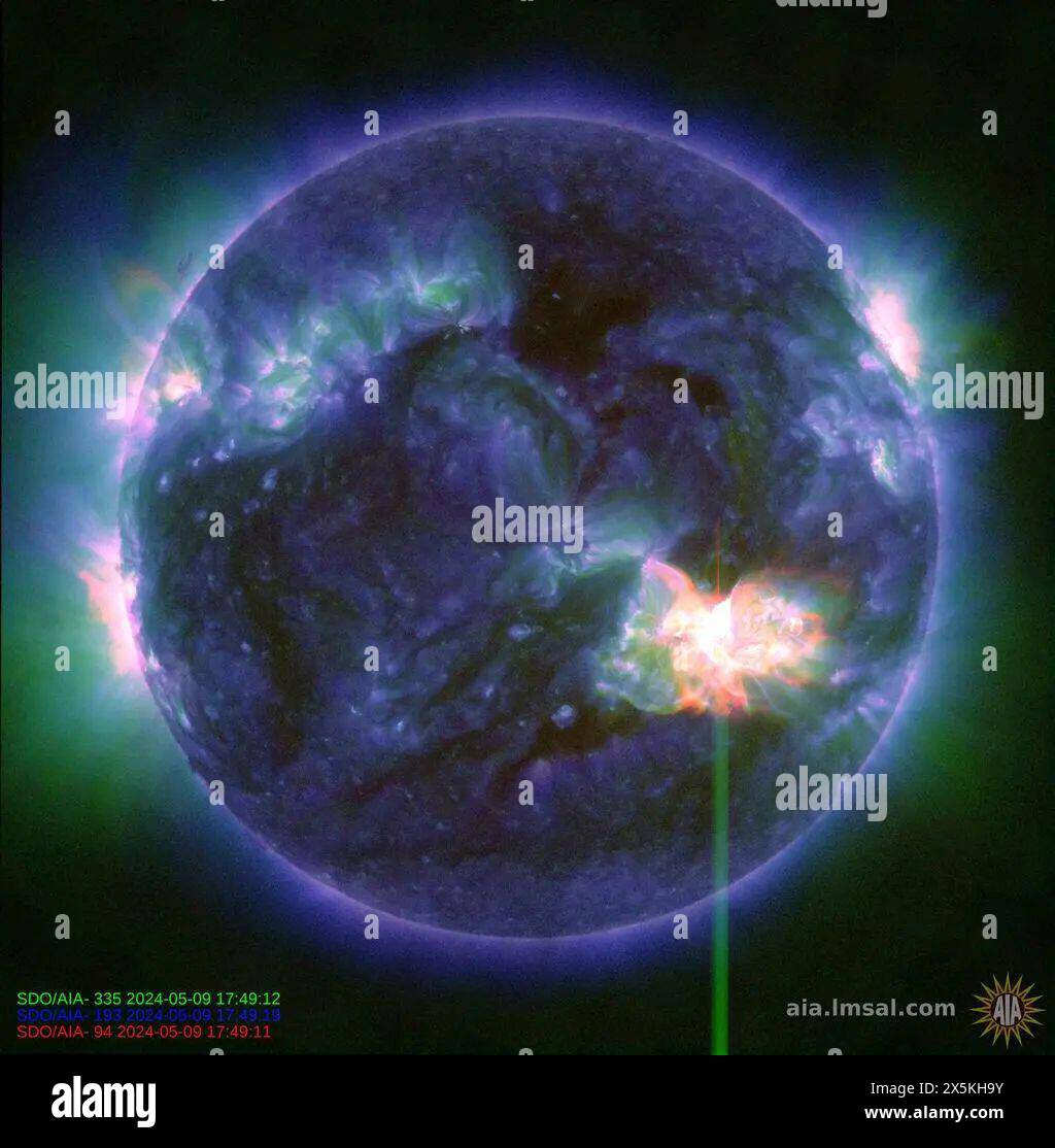 This image provided by NASA shows a solar flare, as seen in the bright ...