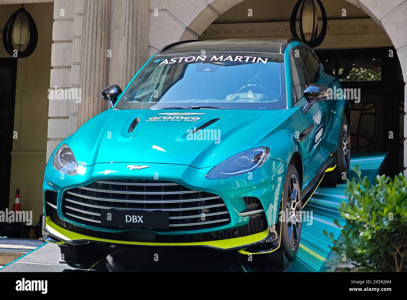 Shanghai, China. 10th May, 2024. An Aston Martin DBX car is leaning on ...