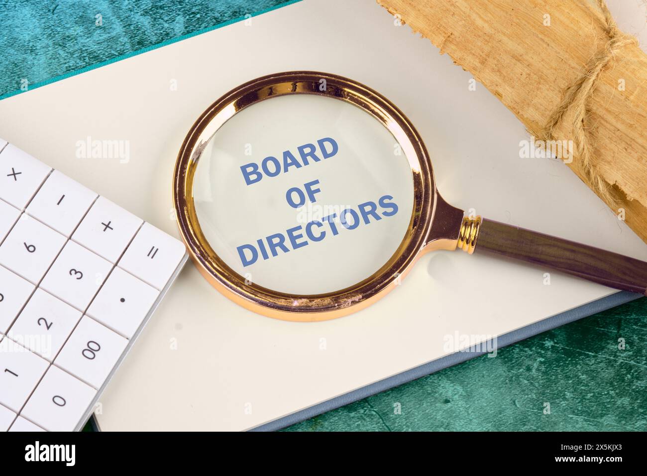 Business concept. Text BOARD OF DIRECTORS through a magnifying glass on ...