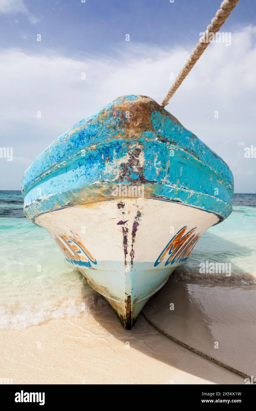 Bow of fishing boat with wooden painted hull on beach Stock Photo - Alamy