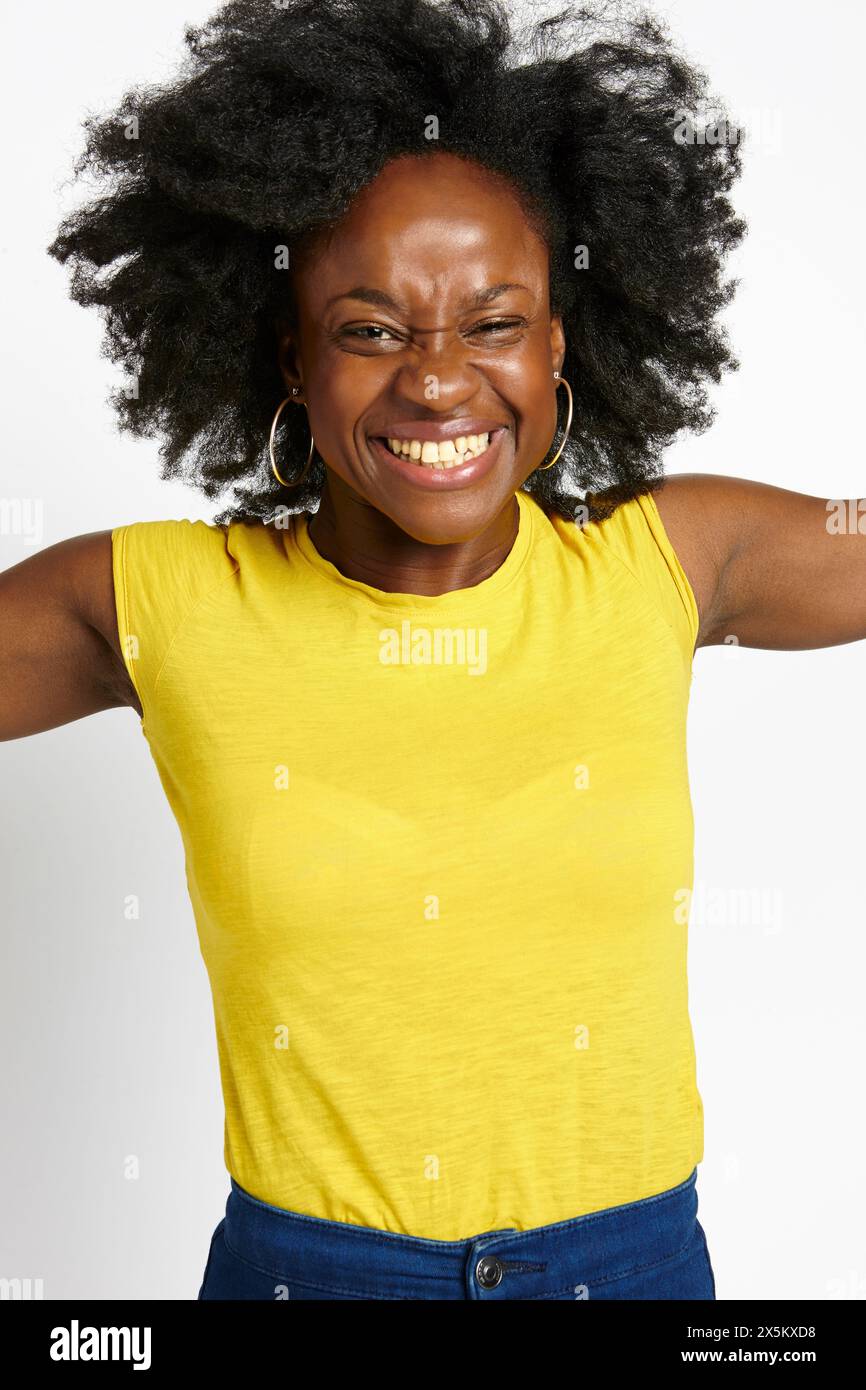 African black woman in yellow hi-res stock photography and images - Alamy