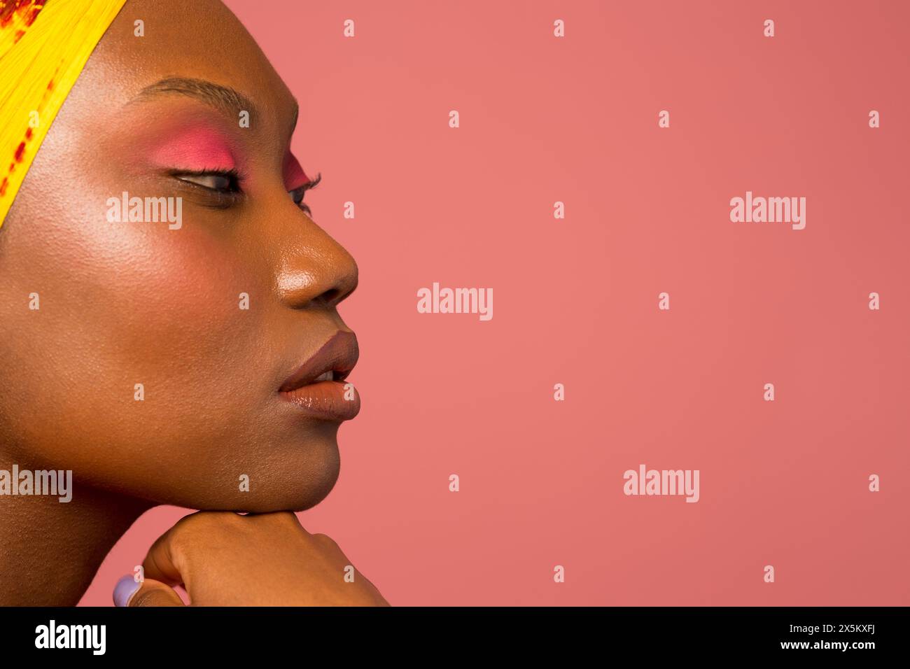 Profile of stylish young woman wearing turban Stock Photo - Alamy