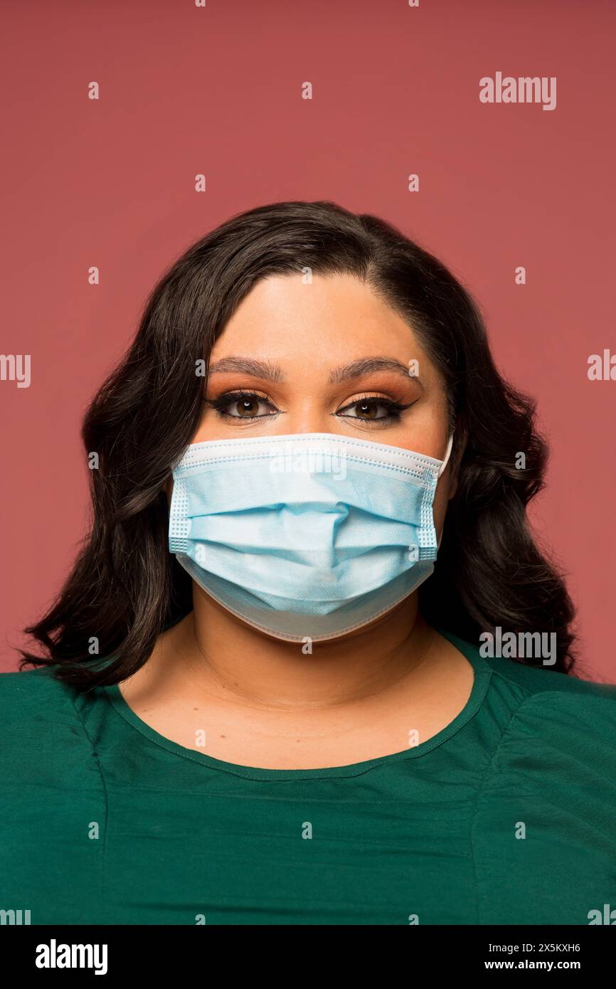 Portrait female in medical mask hi-res stock photography and images - Alamy