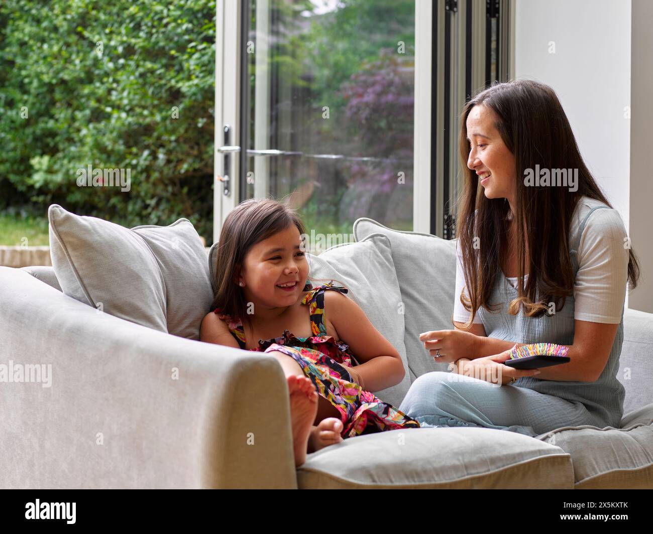 Female child sitting on hi-res stock photography and images - Alamy