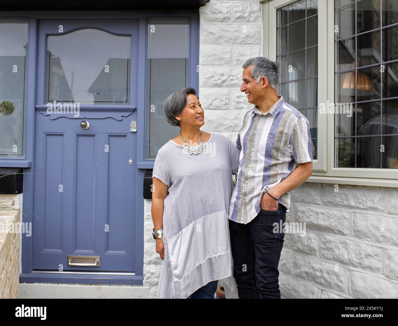 Standing in front of entrance door hi-res stock photography and images ...