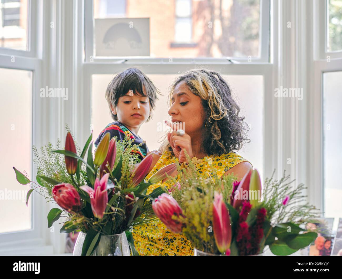 Mother and son with bouquet hi-res stock photography and images - Alamy