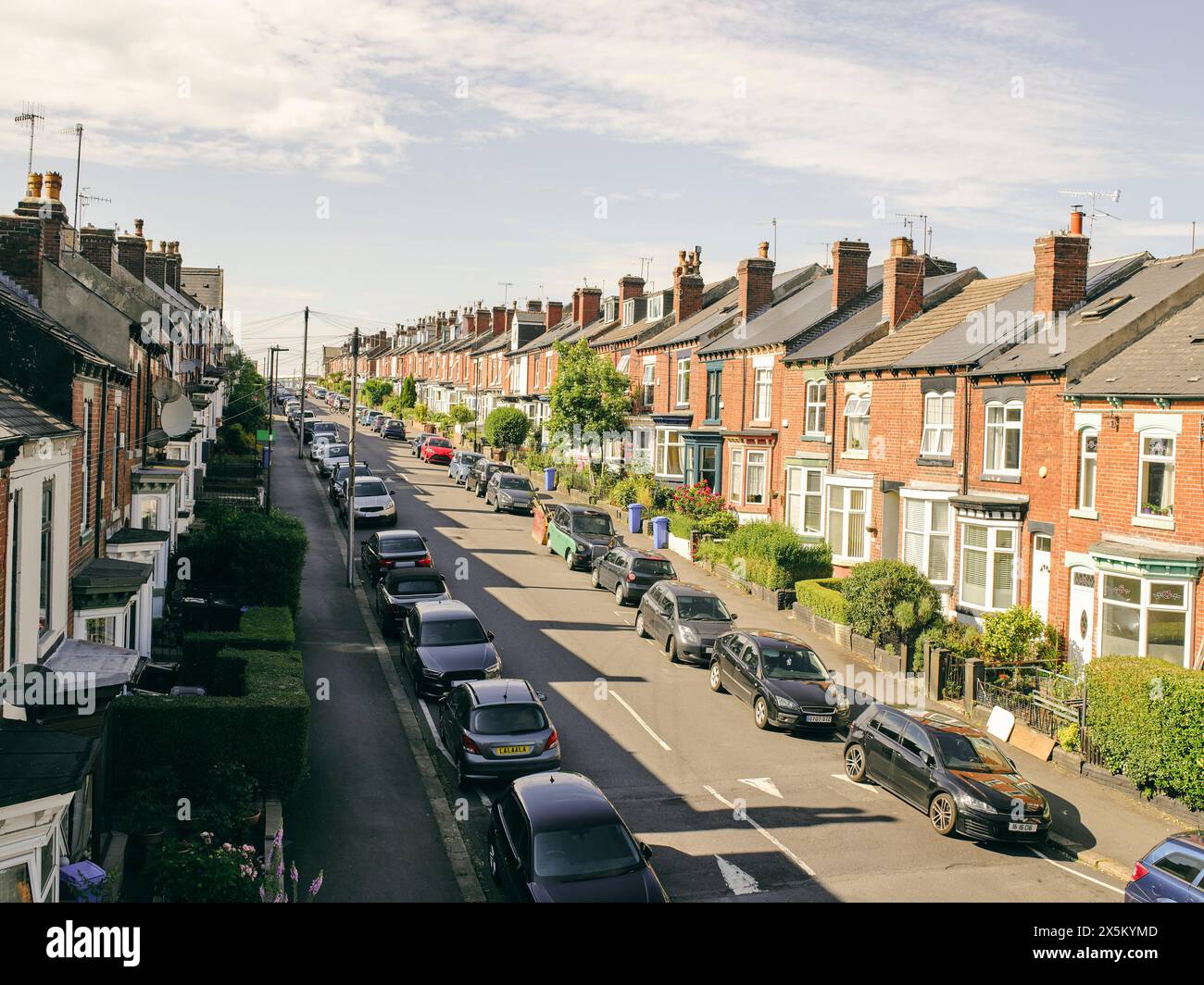 UK, Row houses and cars on street Stock Photo - Alamy