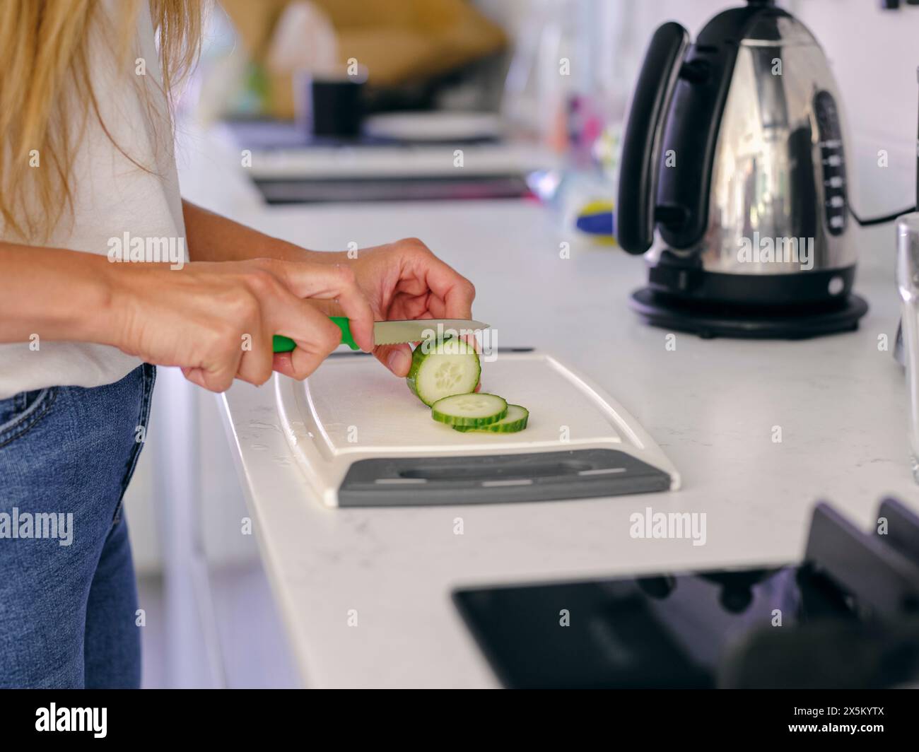 Woman cucumber hi-res stock photography and images - Alamy