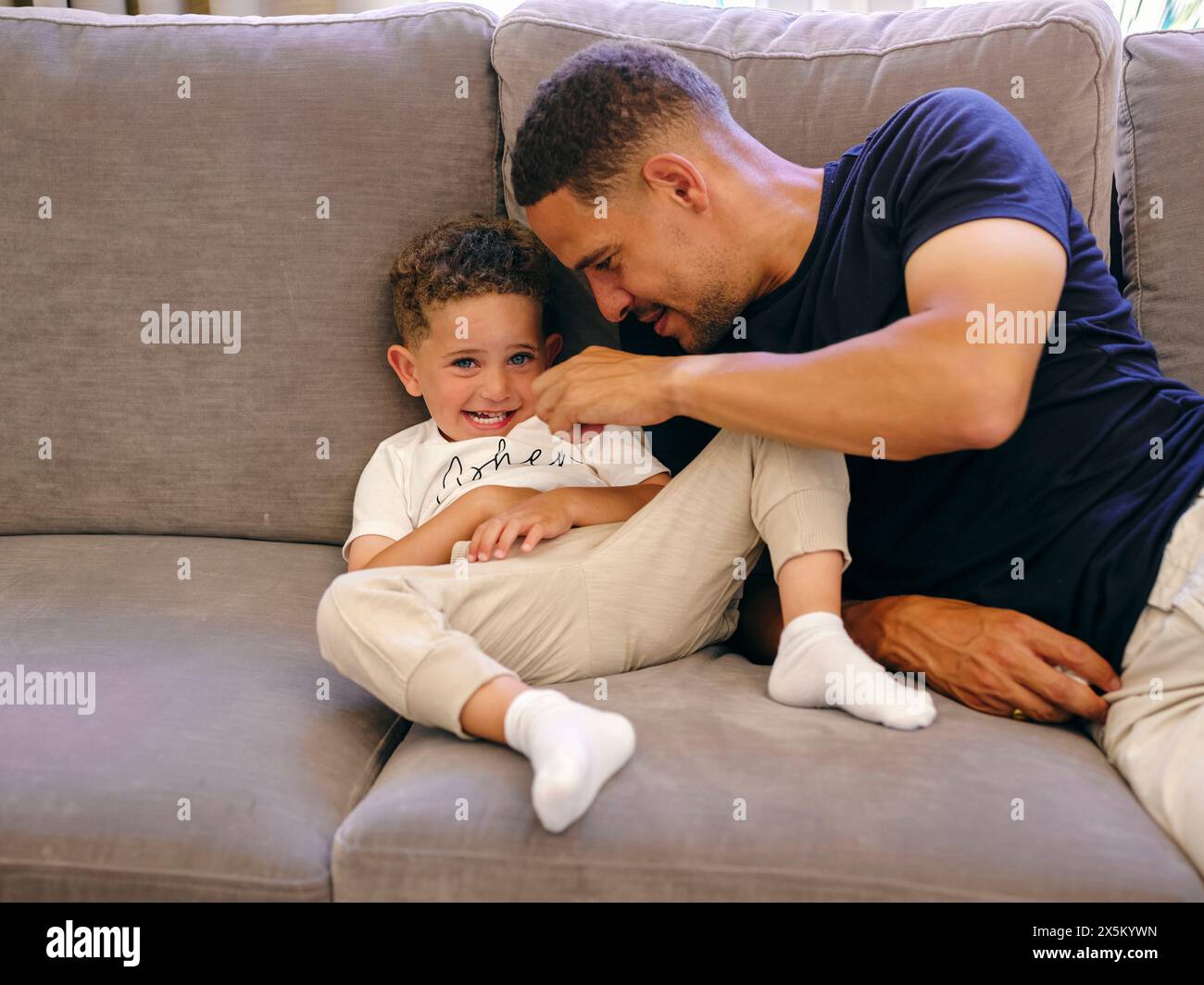 Father and son bonding Stock Photo - Alamy
