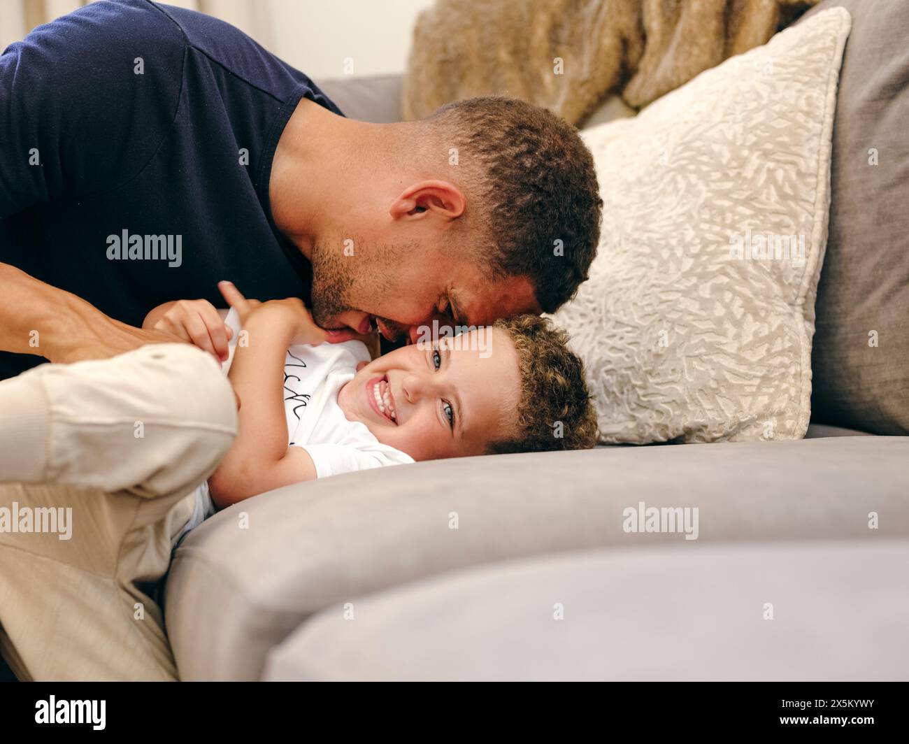 Father and son bonding Stock Photo - Alamy