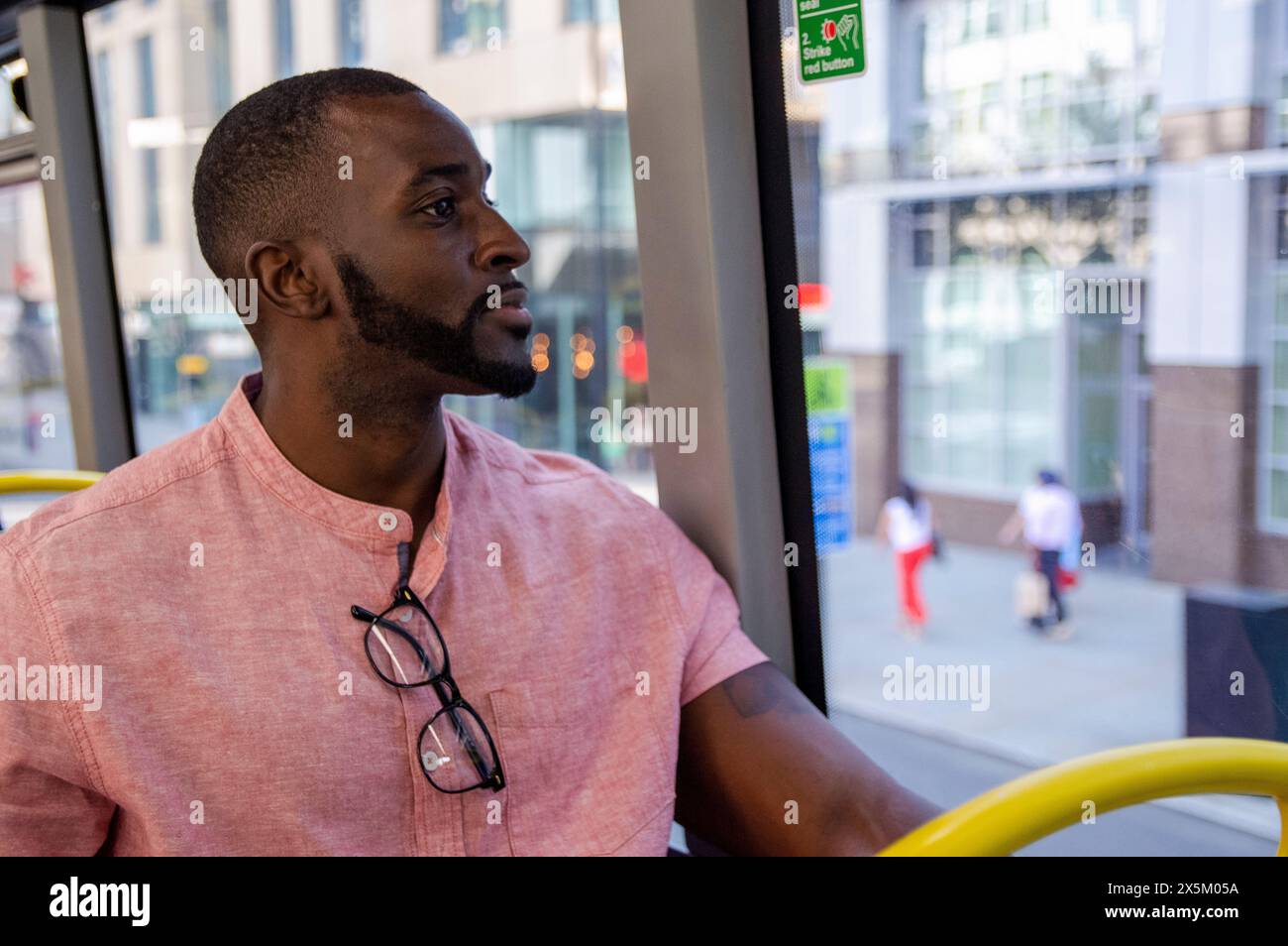 Person sitting on bus hi-res stock photography and images - Alamy