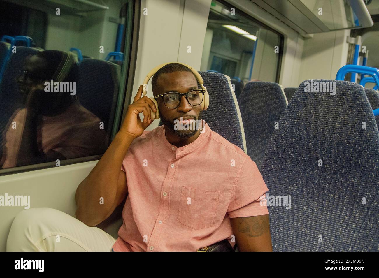 Adult man in train hi-res stock photography and images - Alamy
