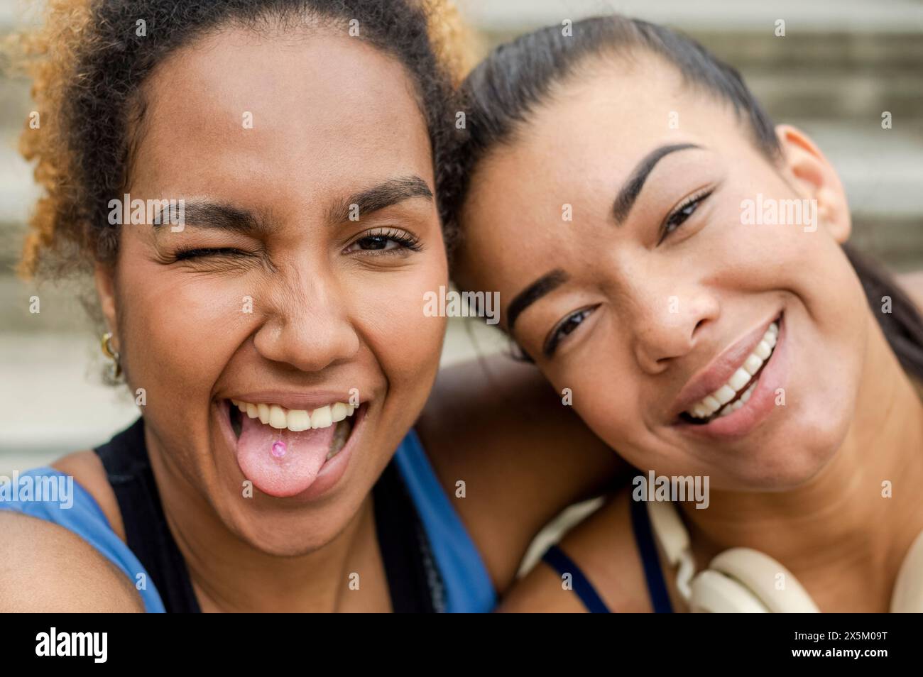 Portrait of female friends making faces Stock Photo - Alamy