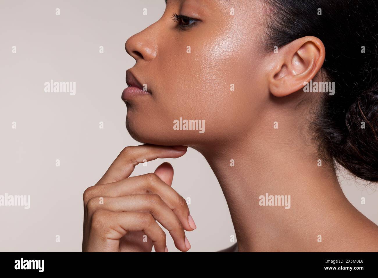 Touching chin hi-res stock photography and images - Alamy