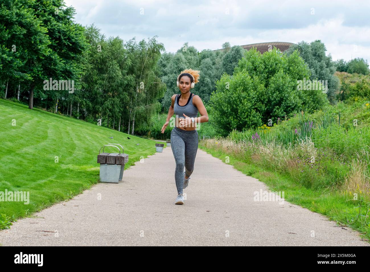Beautiful woman jogging in hi-res stock photography and images - Alamy