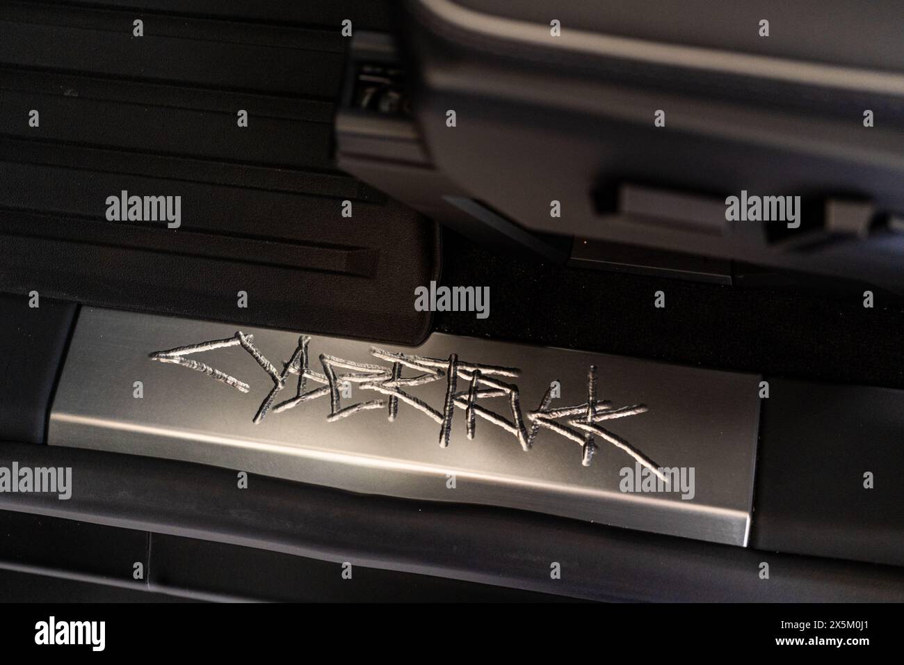 Close-Up of Tesla Cybertruck Signature Metal Engraving Stock Photo - Alamy