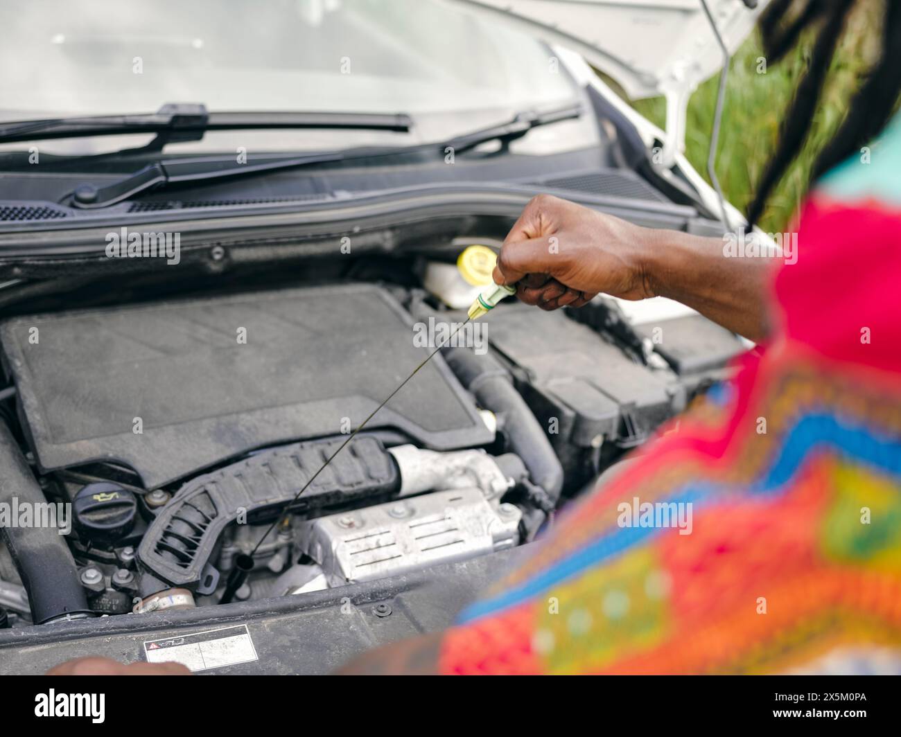 Checking oil car hi-res stock photography and images - Alamy