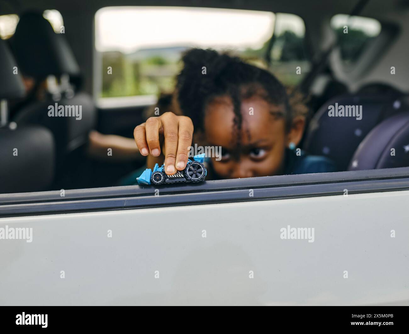 Girl in front of the car hi-res stock photography and images - Alamy