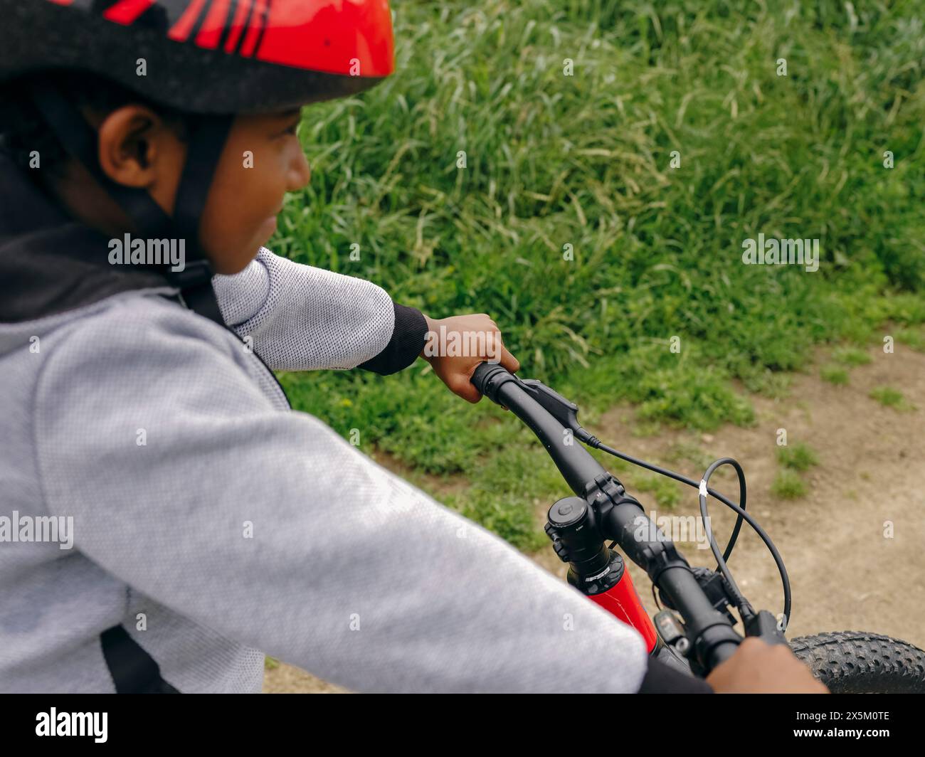 Riding bicycle on dirt road hi-res stock photography and images - Alamy