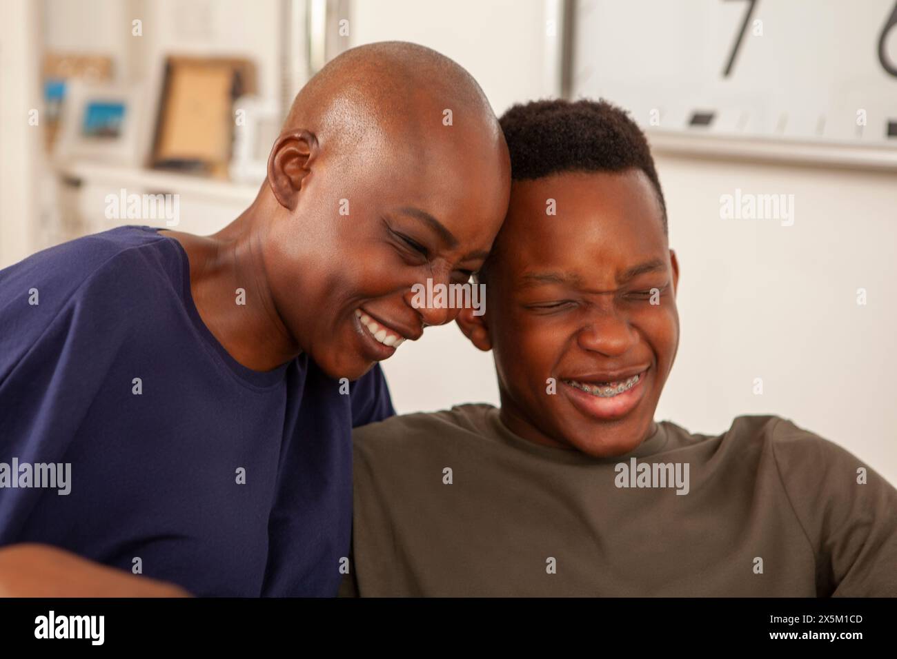 Mother and son laughing Stock Photo - Alamy