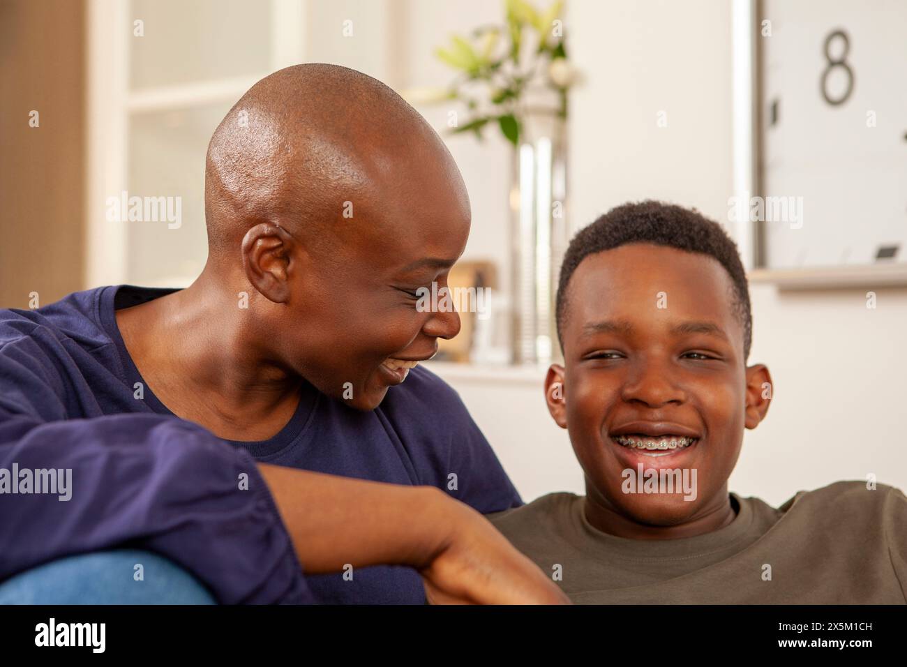 Mother and son laughing Stock Photo - Alamy
