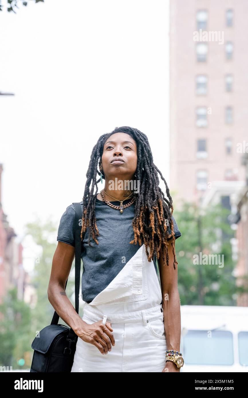 USA, Portrait of young woman on street Stock Photo - Alamy