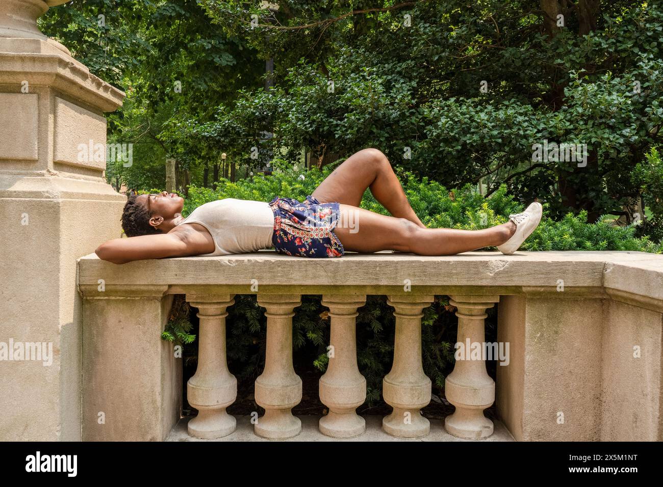 African american woman lying in hi-res stock photography and images - Alamy