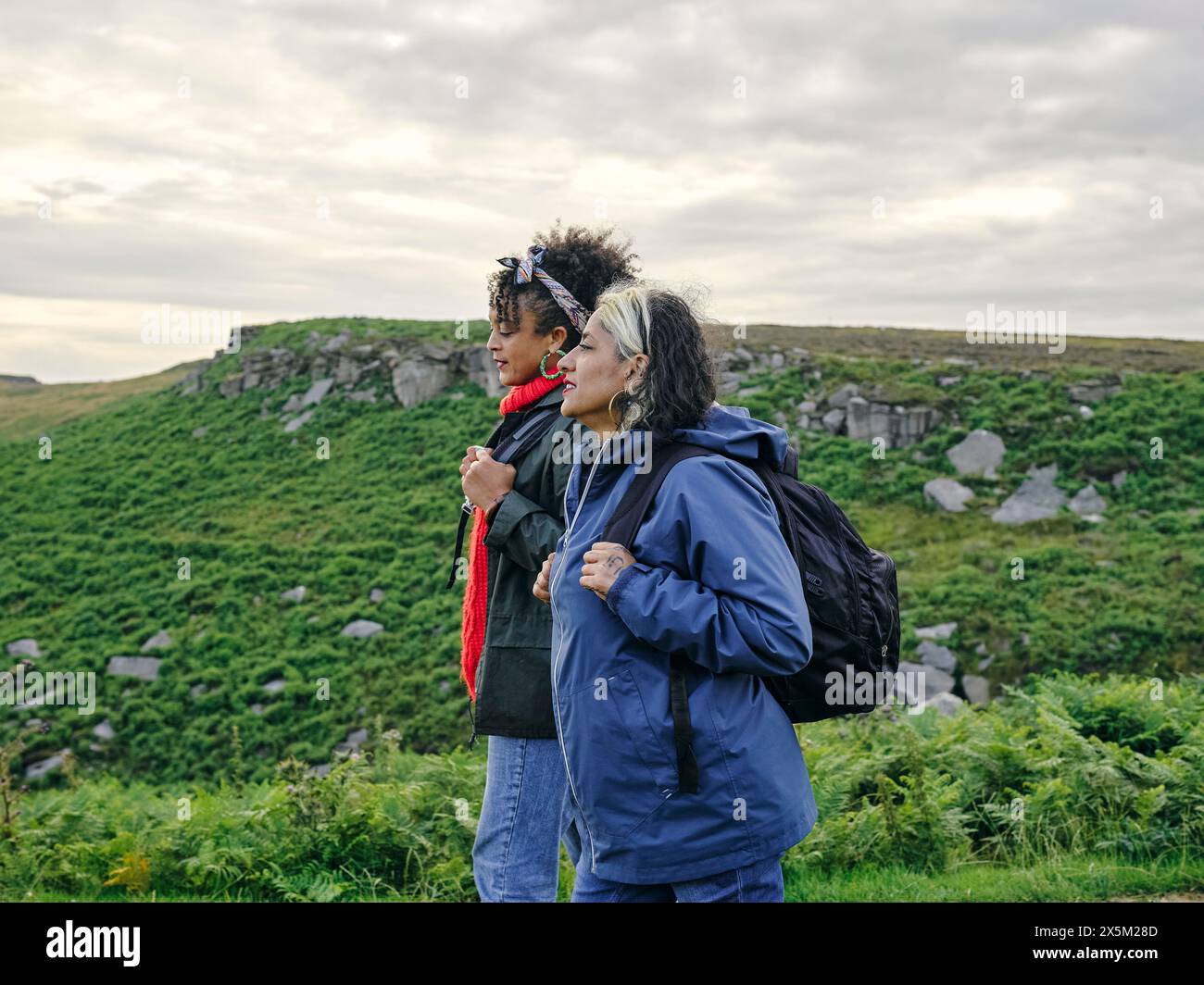 Side view female backpacker hiking hi-res stock photography and images ...
