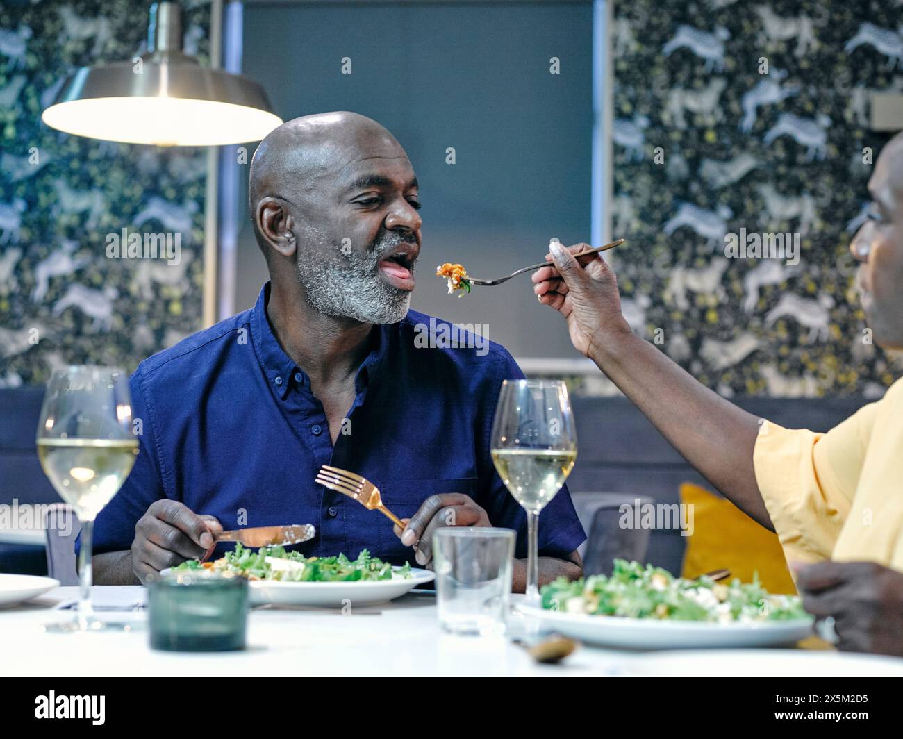 Sharing table restaurant hi-res stock photography and images - Alamy