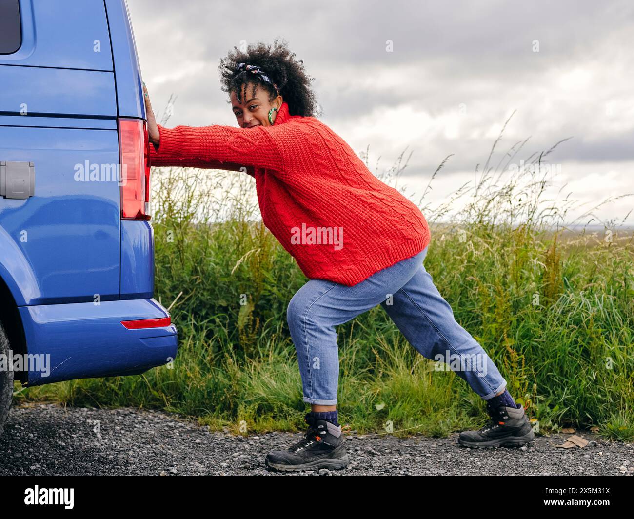 Woman by van hi-res stock photography and images - Alamy