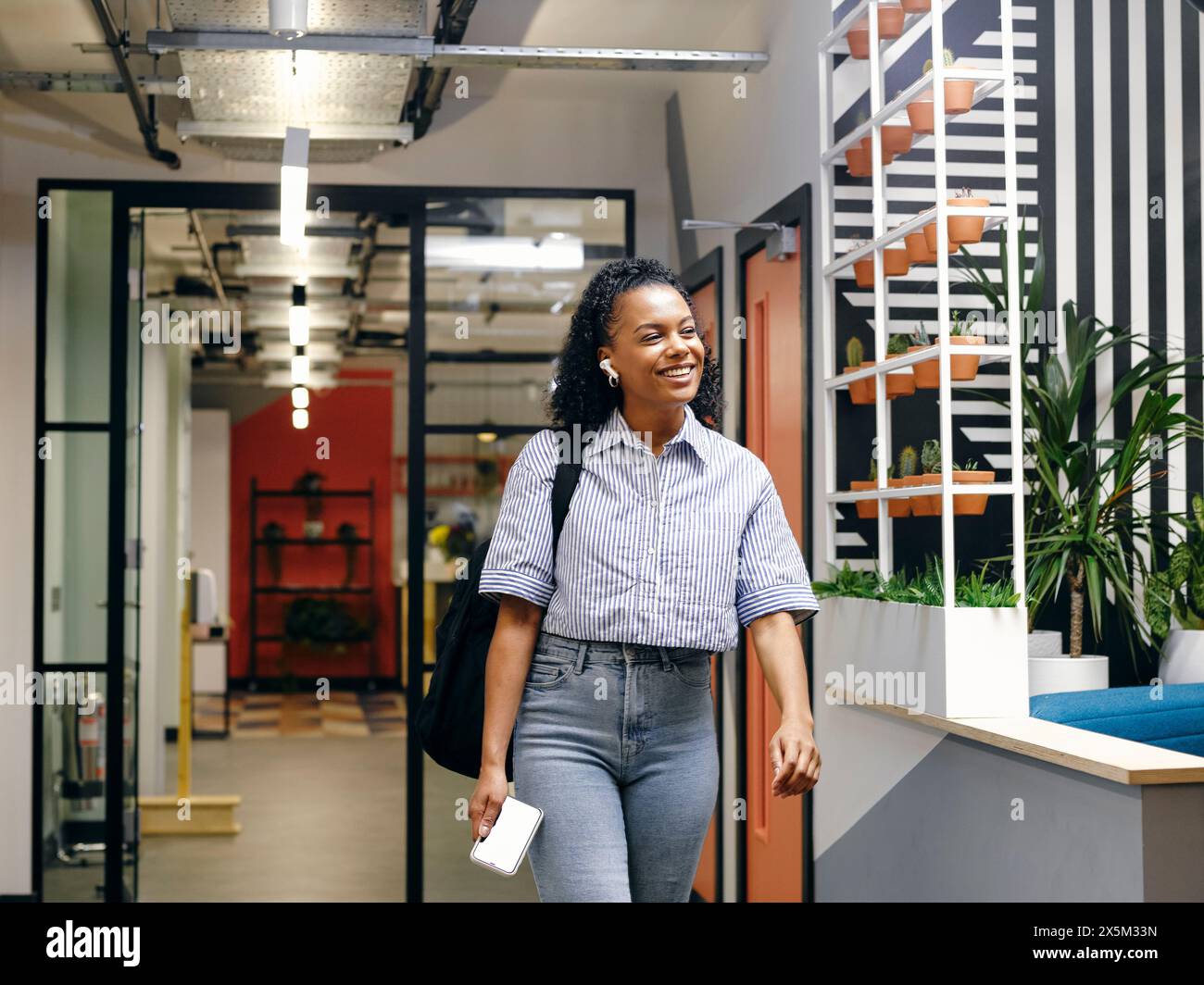 Woman walking office young hi-res stock photography and images - Alamy