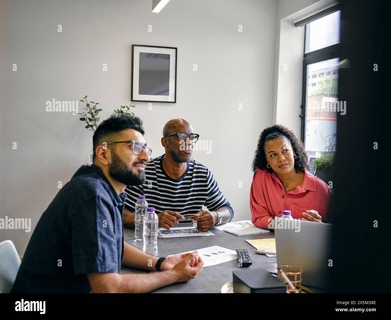Business person meeting colleagues hi-res stock photography and images ...